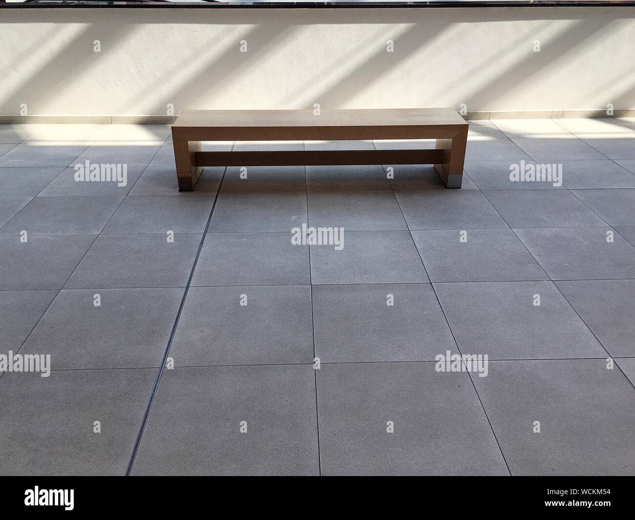 Pavement bench hi-res stock photography and images - Alamy
