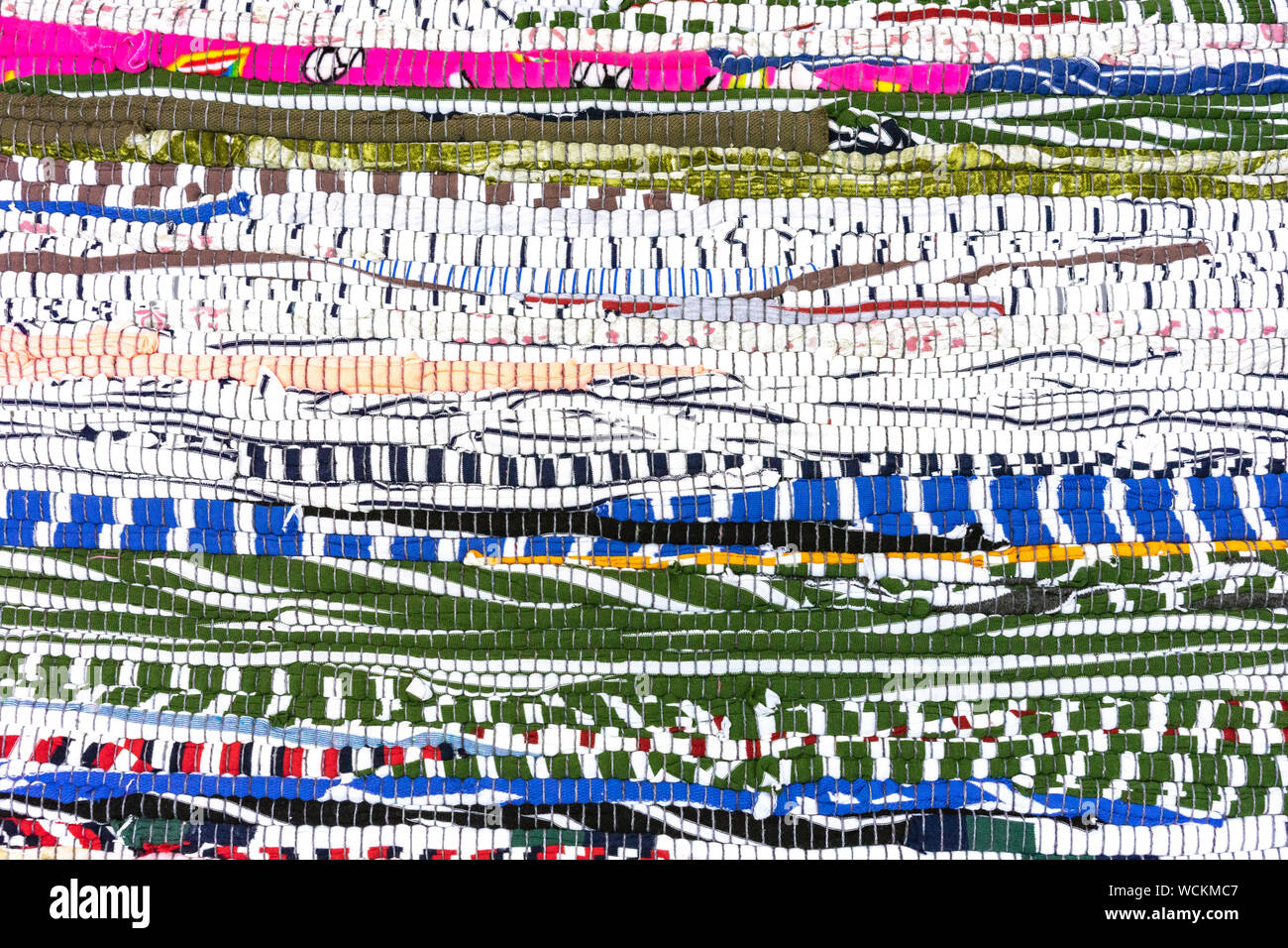 Rug of pieces of cloth. Texture and background of patchwork carpet ...