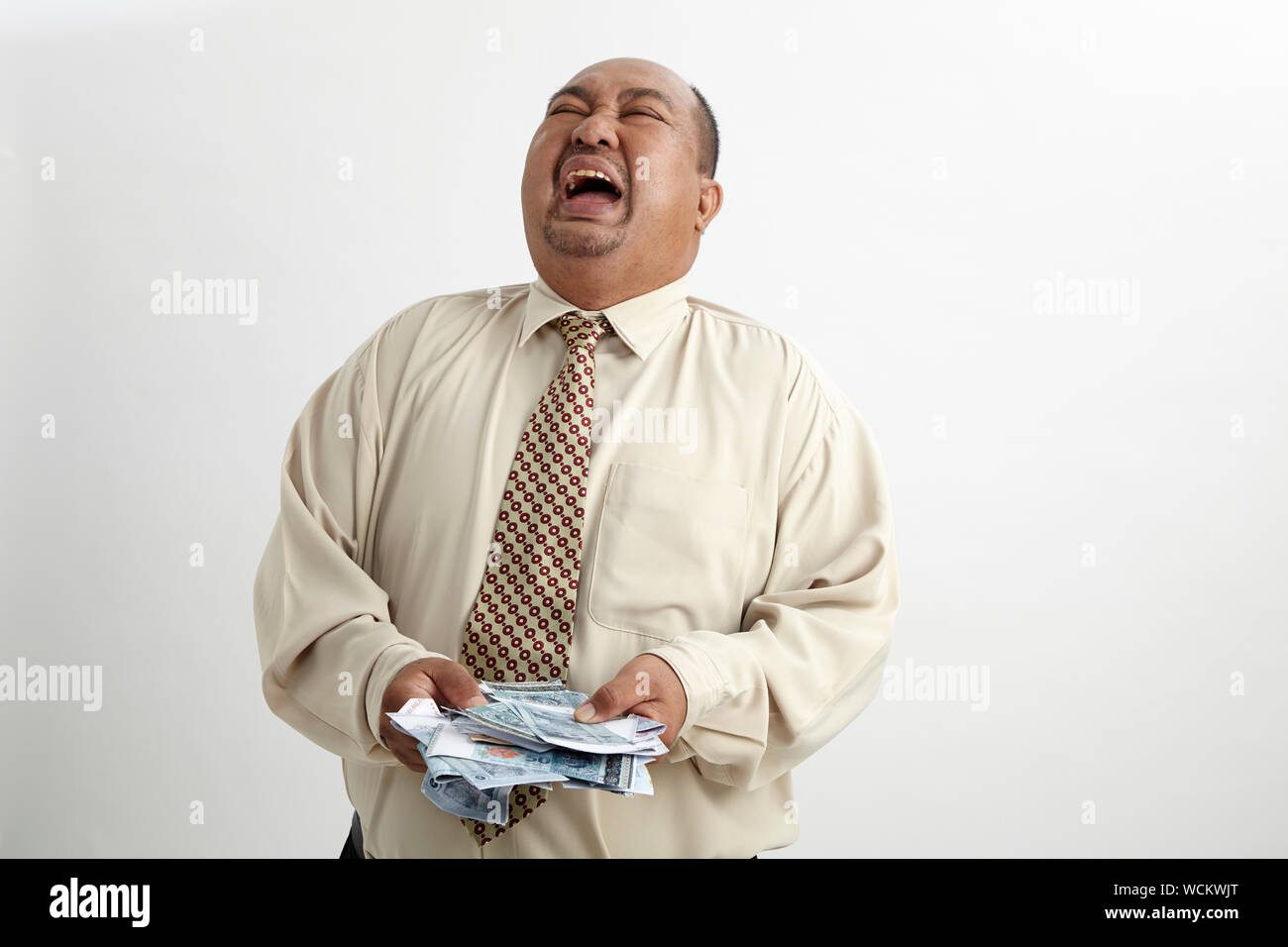 Man crying money hi-res stock photography and images - Alamy