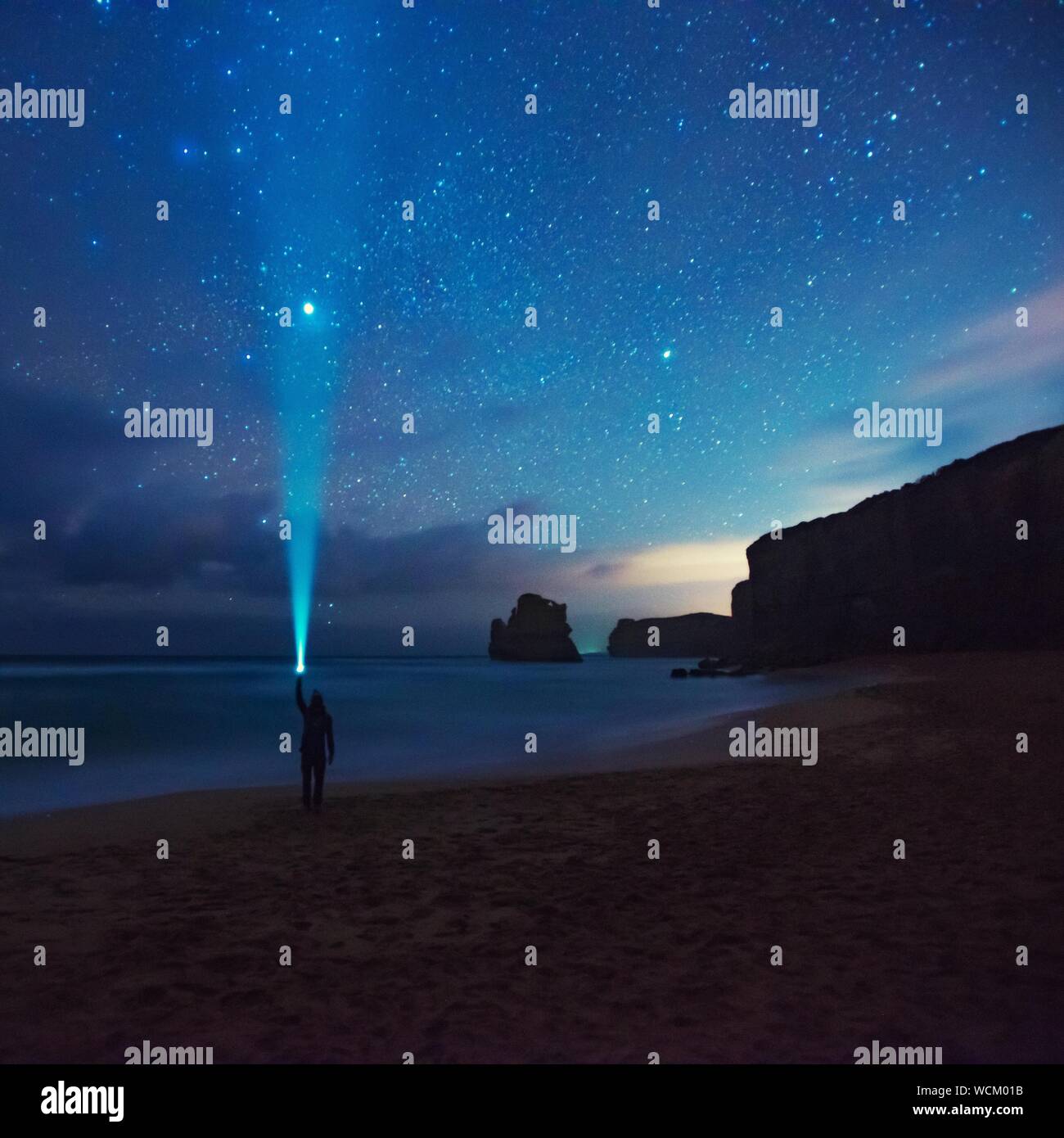 Person in field pointing hi-res stock photography and images - Alamy