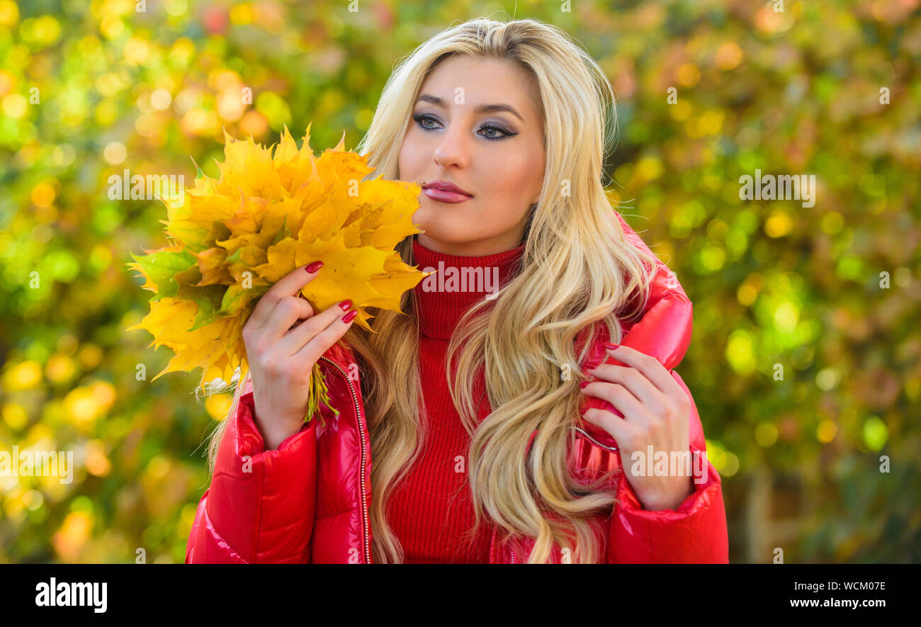 Autumn is her favorite season of year. Woman walk in autumn park. Girl ...