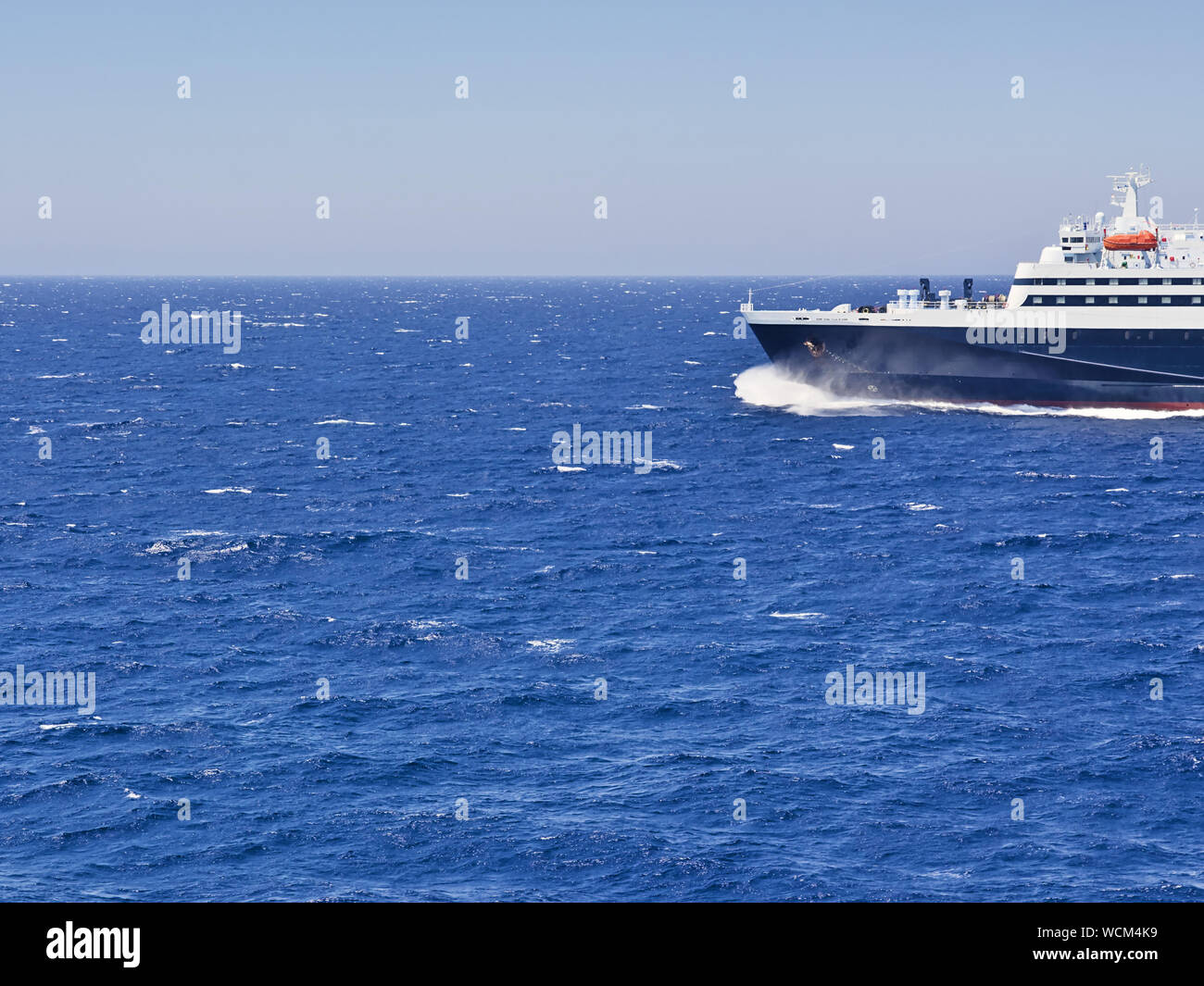 Large ship sailing on open sea Stock Photo - Alamy