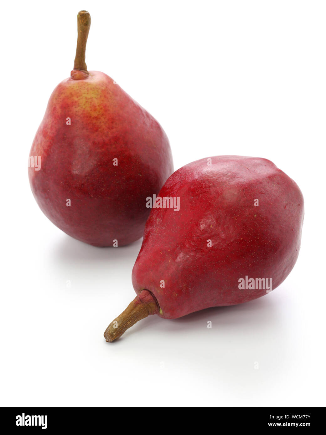 red pears, star crimson isolated on white background Stock Photo - Alamy