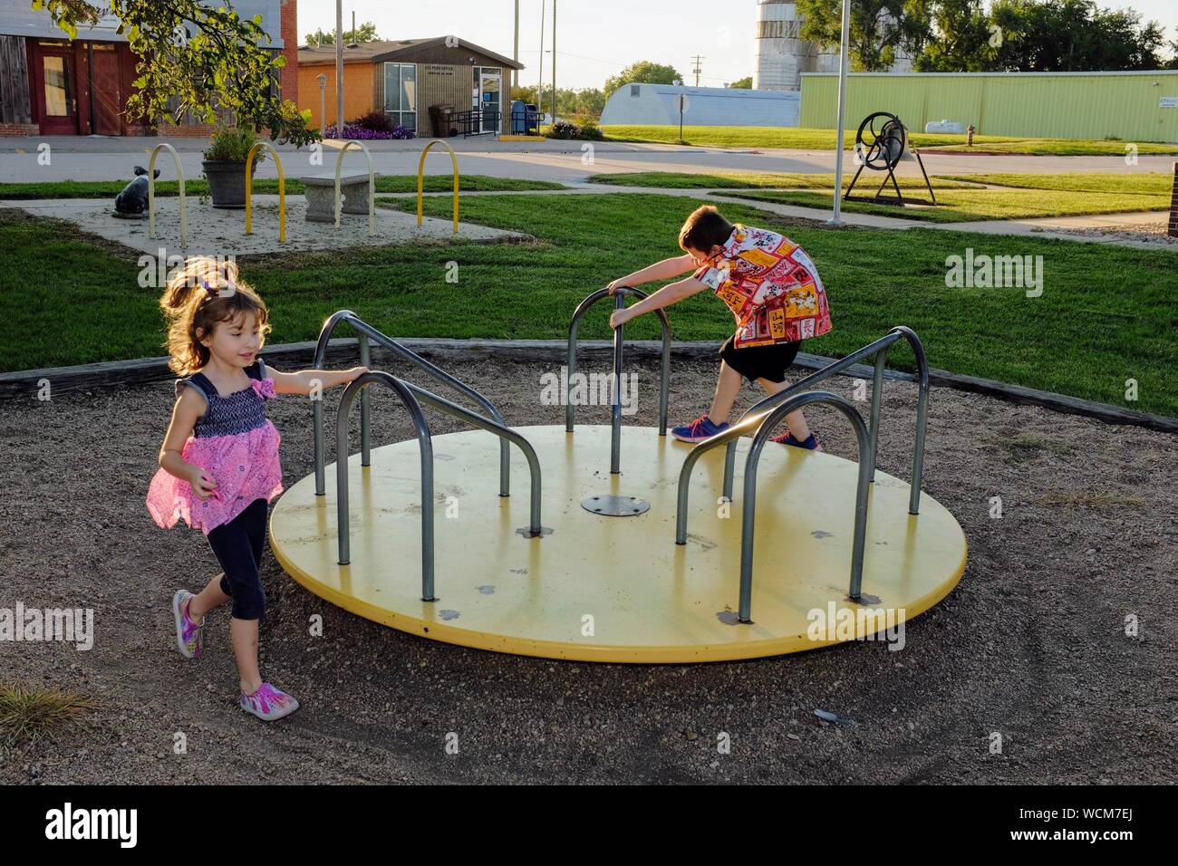 Children playing in playground hi-res stock photography and images - Alamy
