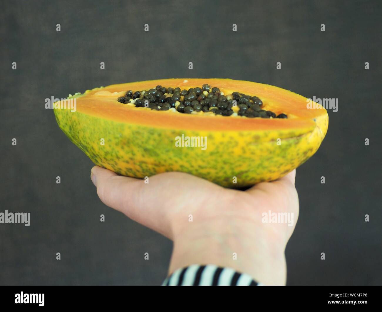 Long papaya hi-res stock photography and images - Alamy