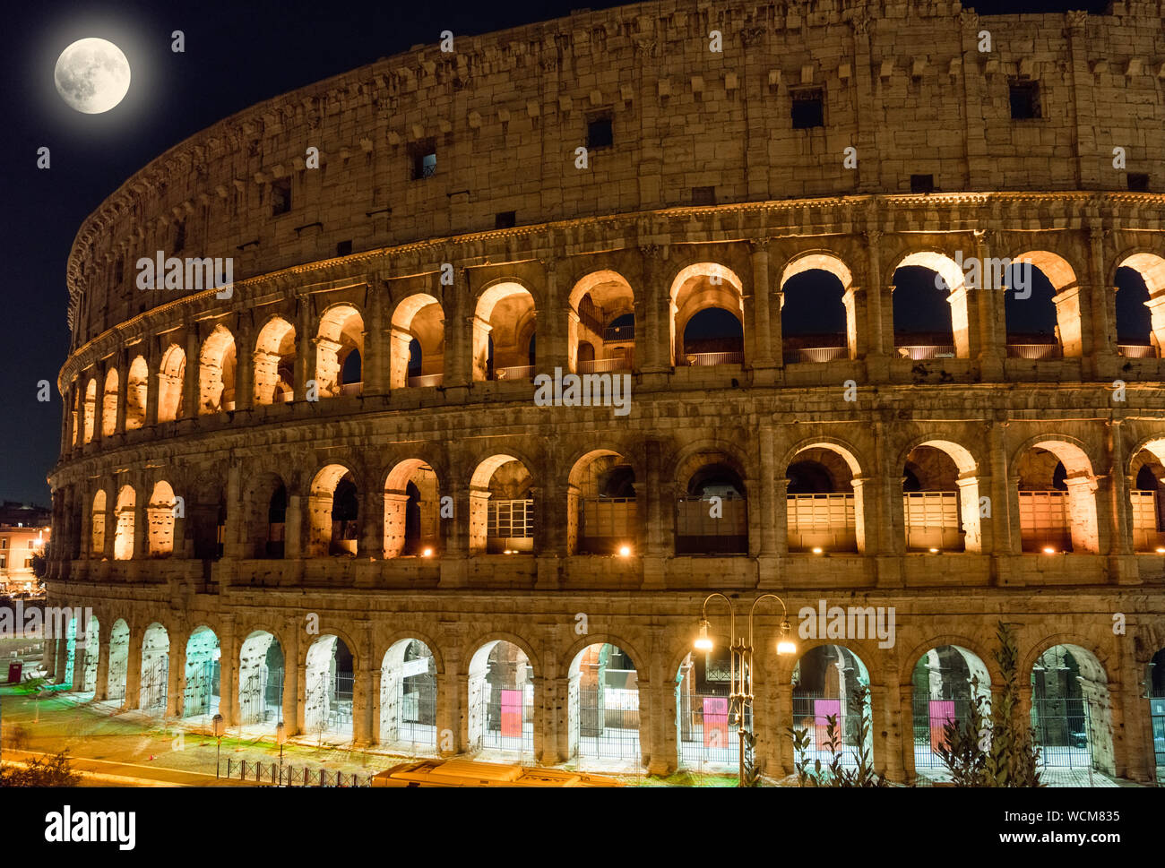 Colosseum At Night With Moon