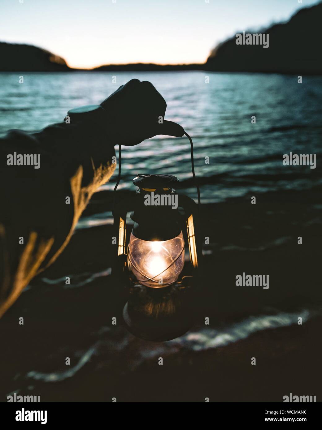 Holding a lantern hi-res stock photography and images - Alamy