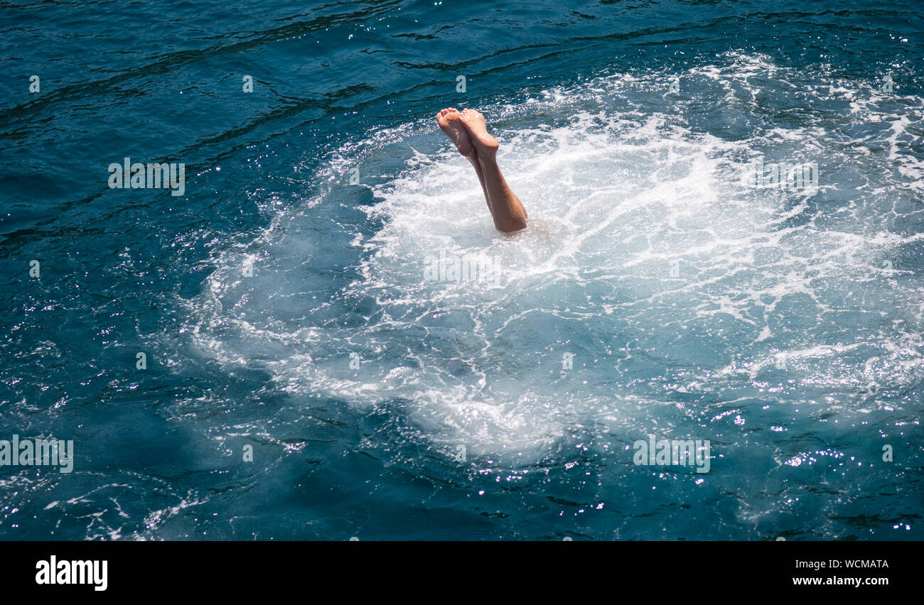 Diving low hi-res stock photography and images - Alamy