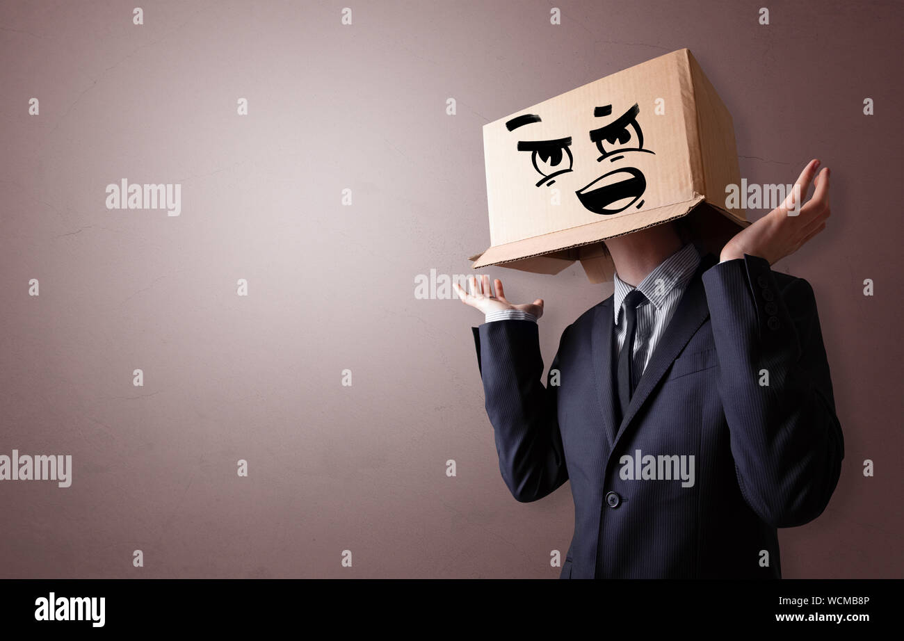 Man with cardboard box head Stock Photo - Alamy