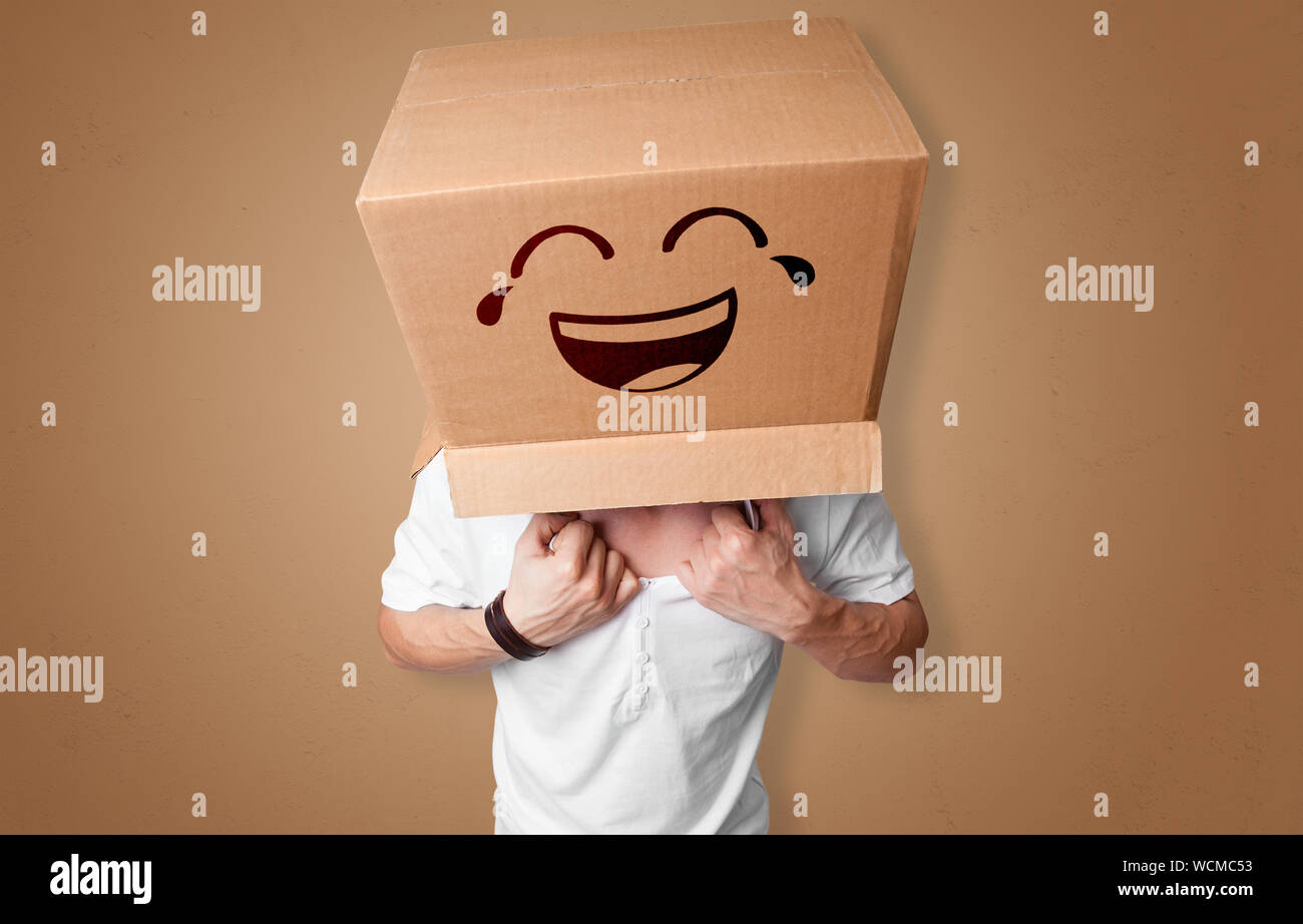 Funny man wearing cardboard box on his head with smiley face Stock ...