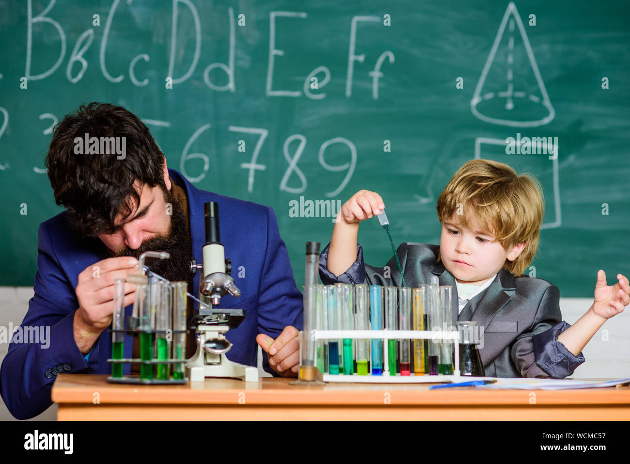 A Partnership in Discovery. Wisdom. Back to school. Flask in scientist ...
