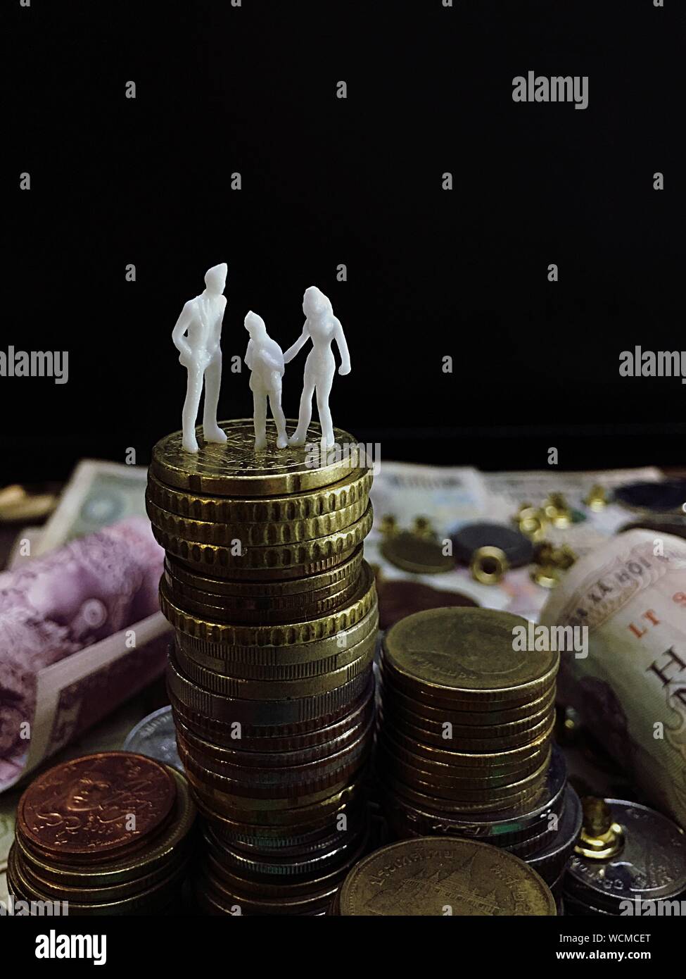 Money stack figurines hi-res stock photography and images - Alamy