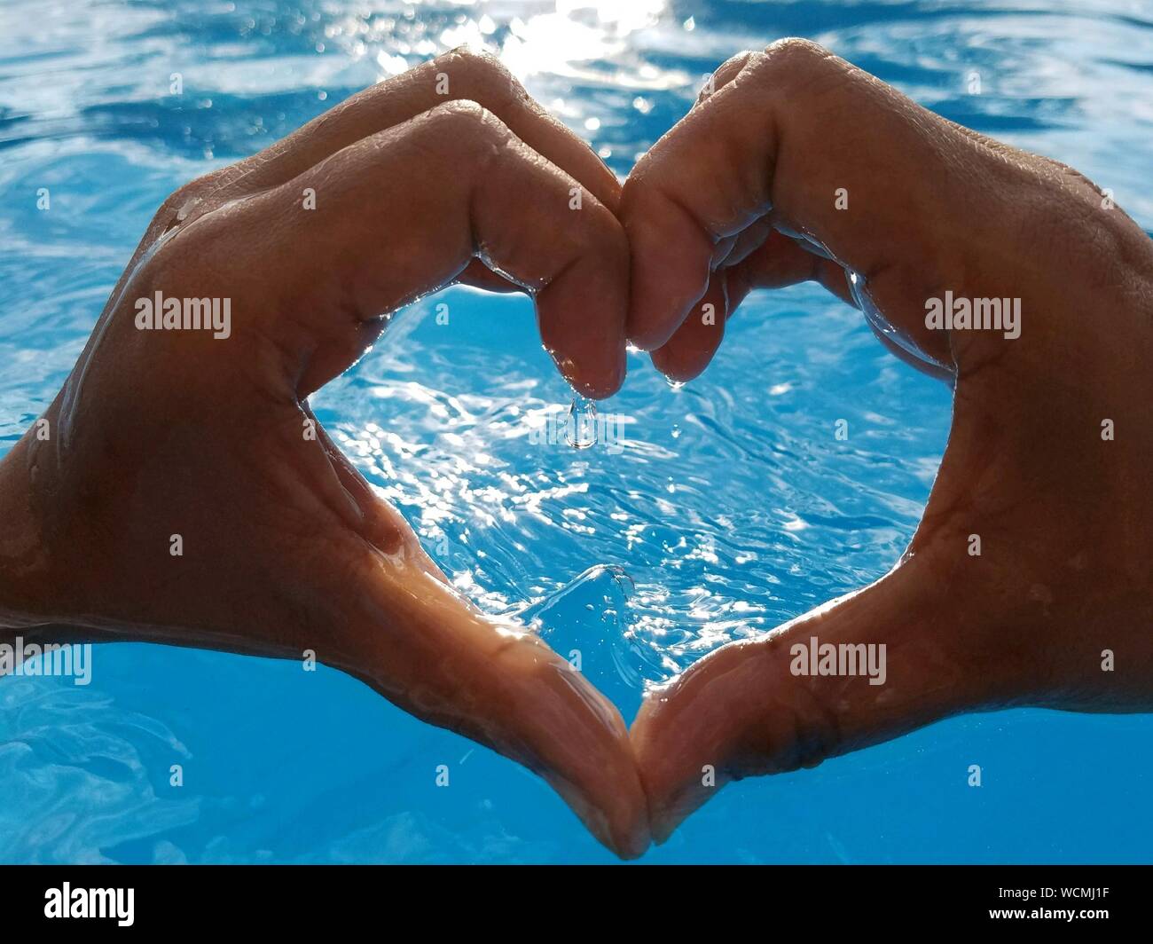 Hands making heart shape hi-res stock photography and images - Alamy