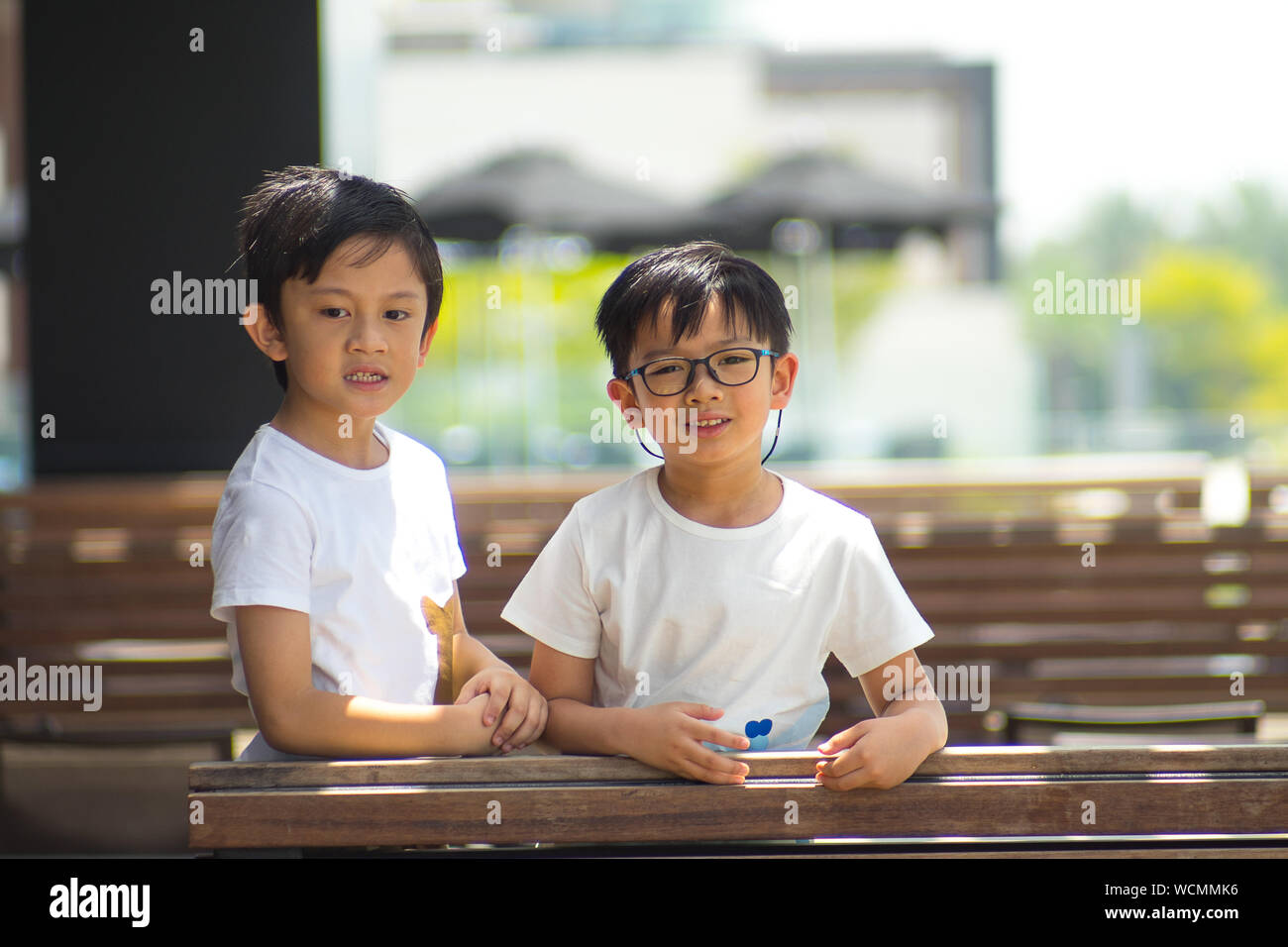 Portrait of two boys smiling hi-res stock photography and images - Alamy