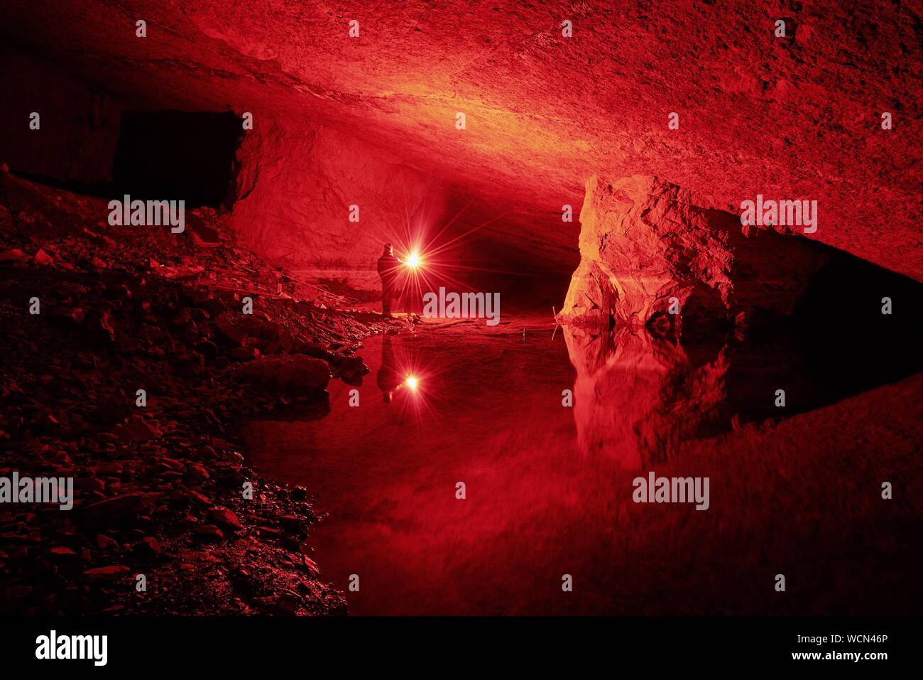 Flashlight in cave hi-res stock photography and images - Alamy