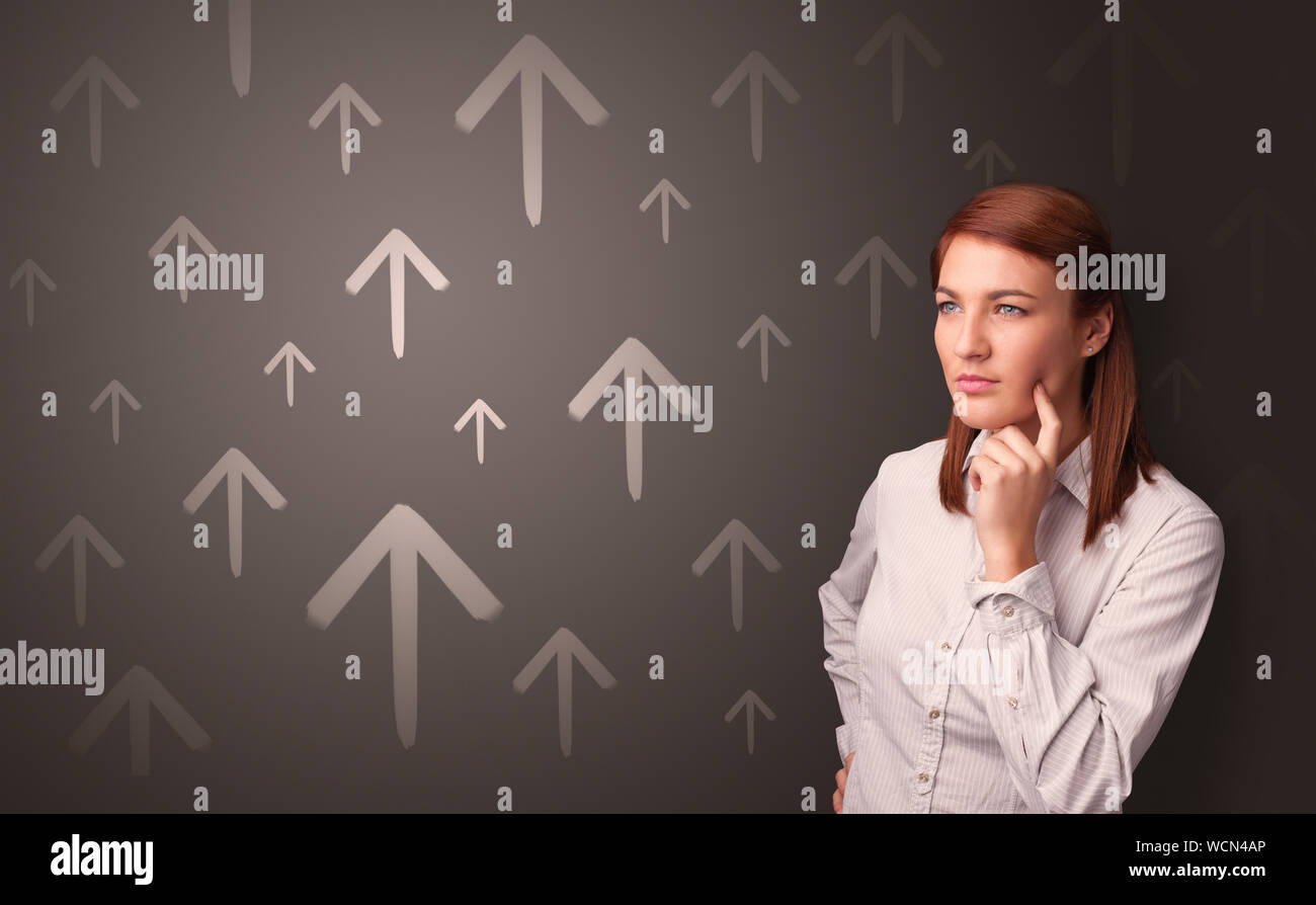 Young person thinking with direction concept background Stock Photo - Alamy