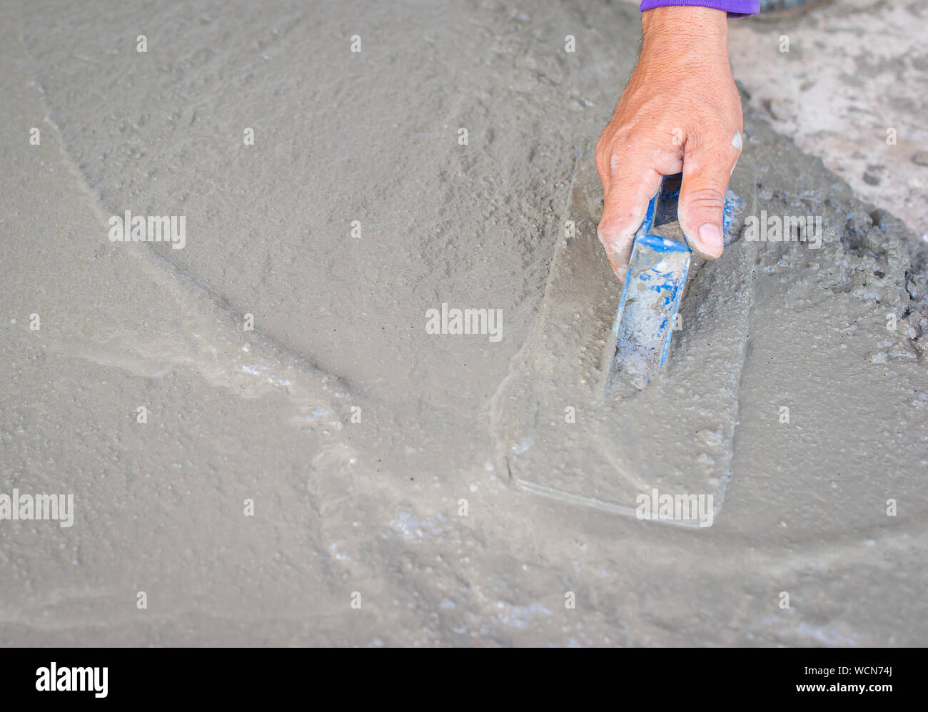 Cement construction hand hi-res stock photography and images - Alamy
