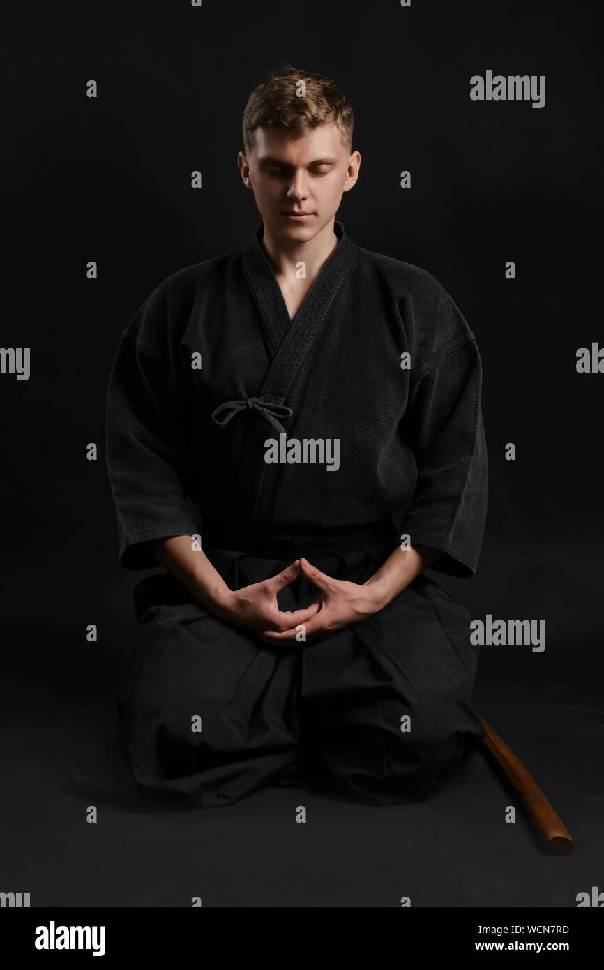 Skillful Kendo fighter wearing in a traditional japanese kimono is ...