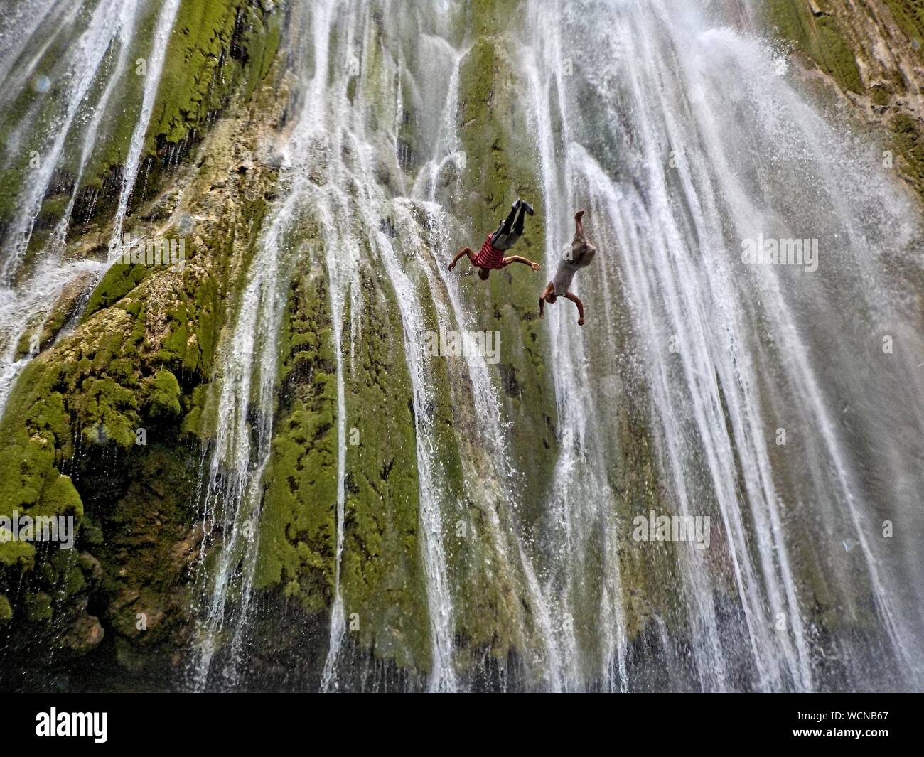 Waterfall two men hi-res stock photography and images - Alamy