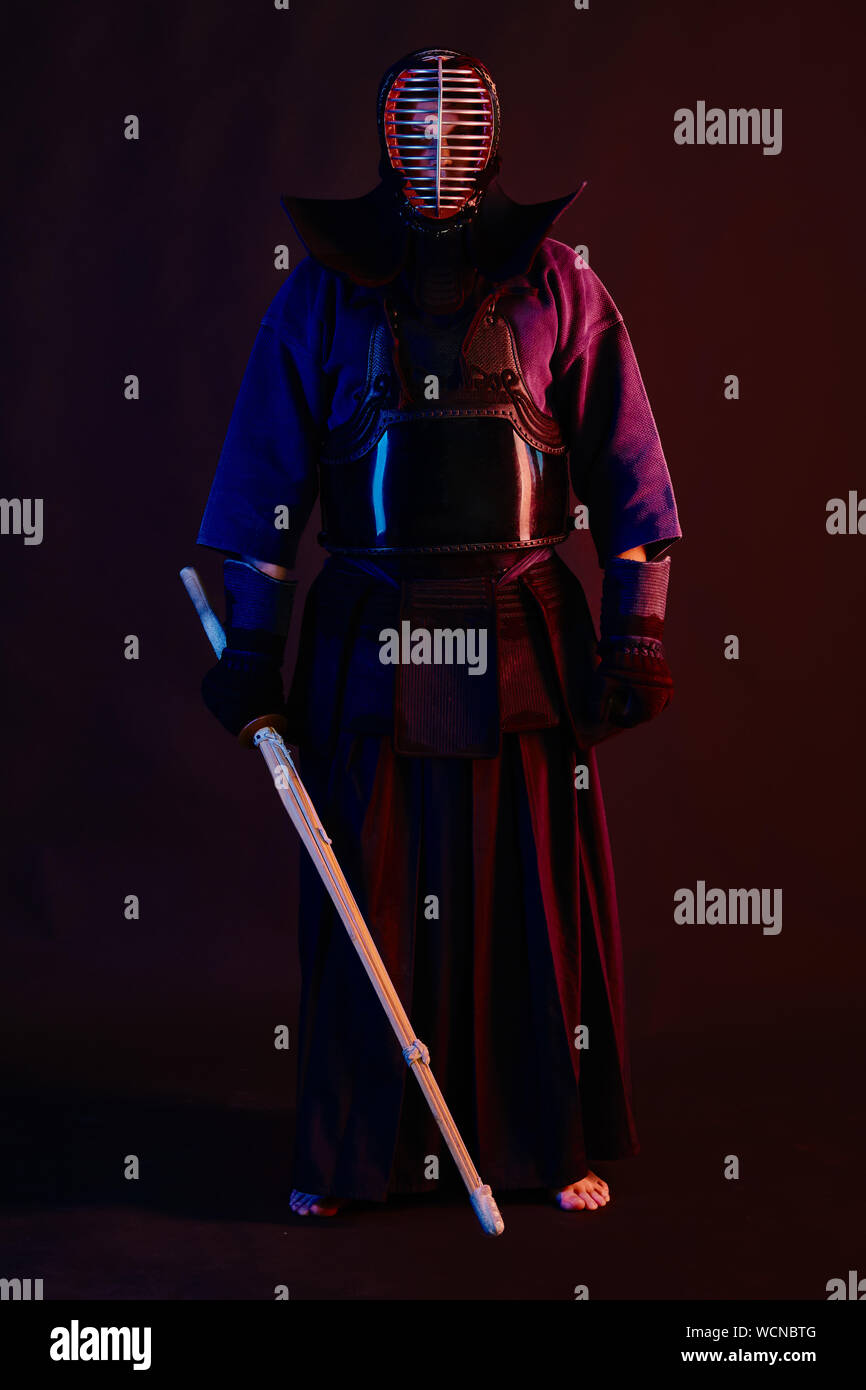 Professional Kendo master wearing in an armor, traditional kimono and ...