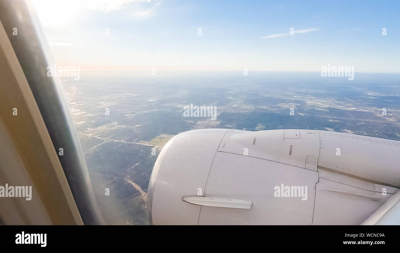 View from the window seat of commercial passenger airplane Stock Photo ...