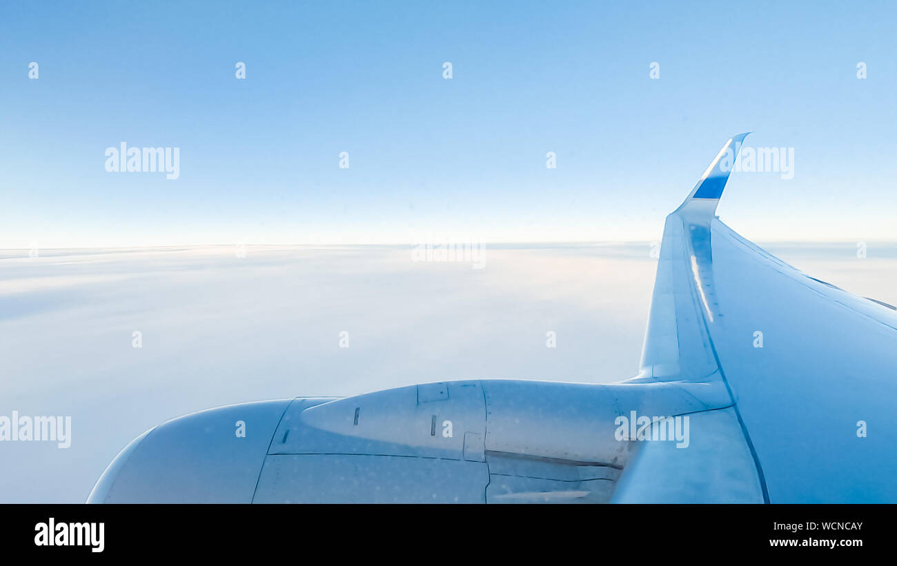 View from the window seat of commercial passenger airplane Stock Photo ...