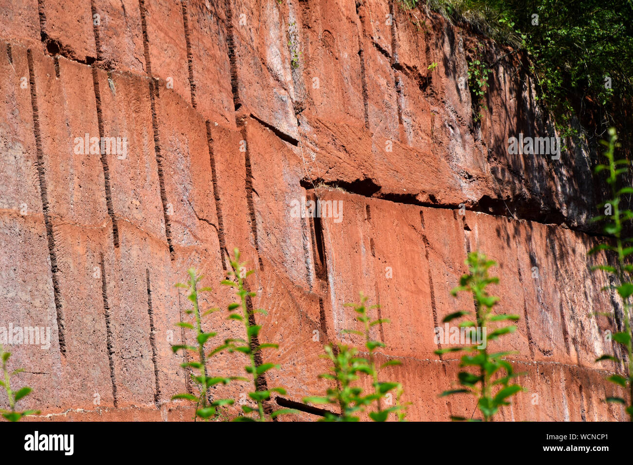 Rugged Red Volcanic Tuff Rock Wall at the Michelnau Stone Pit, a ...