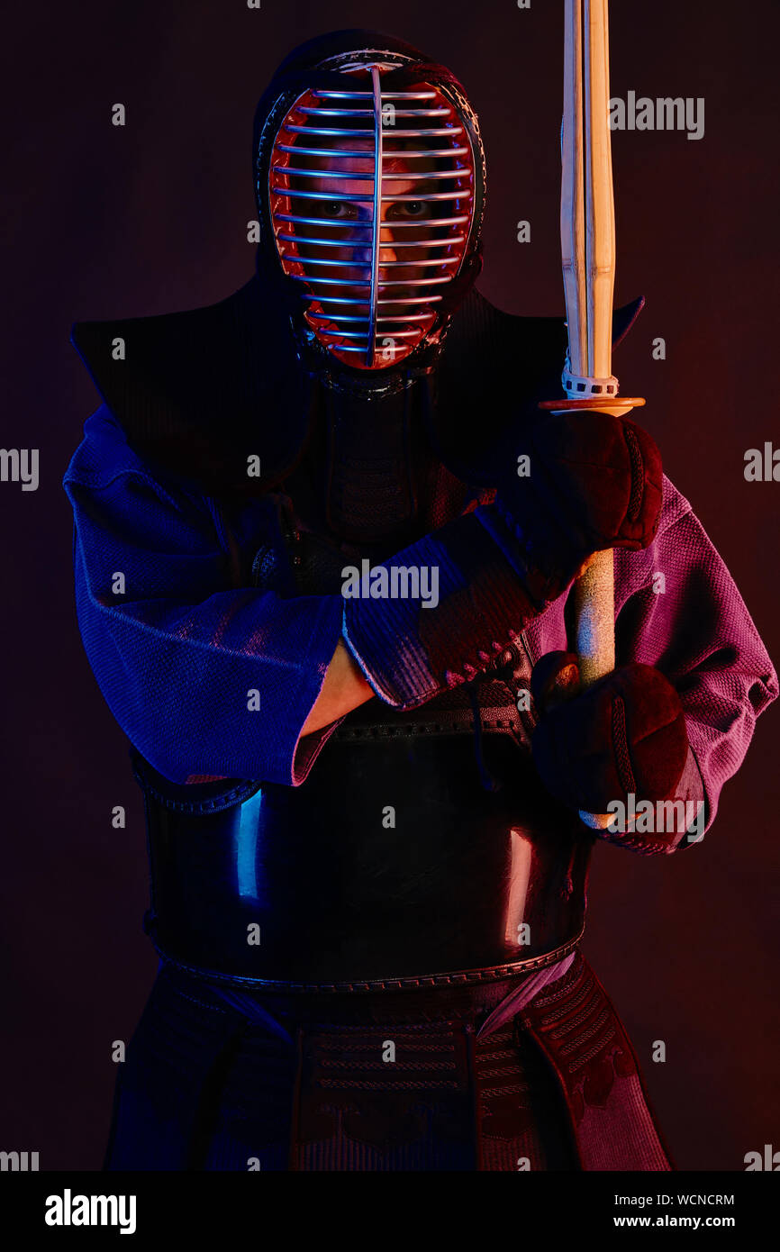 Professional Kendo instructor wearing in an armor, traditional kimono ...