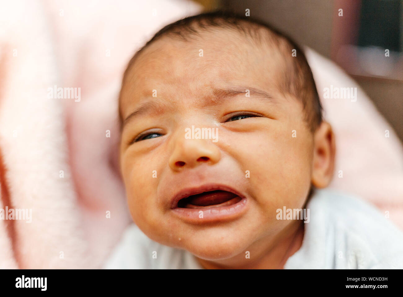 Close up baby crying hi-res stock photography and images - Alamy