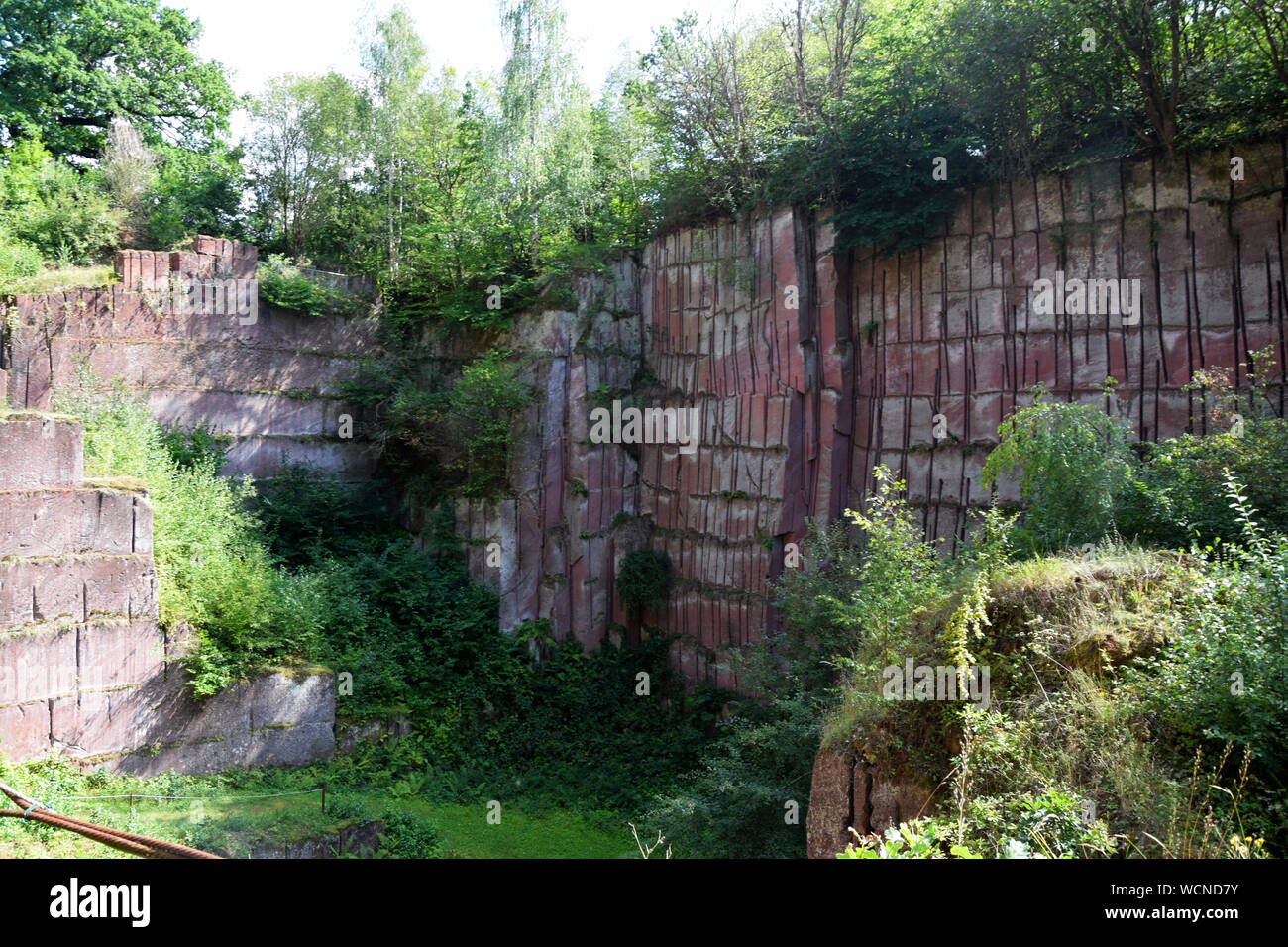 Rugged Red Volcanic Tuff Rock Wall at the Michelnau Stone Pit, a ...
