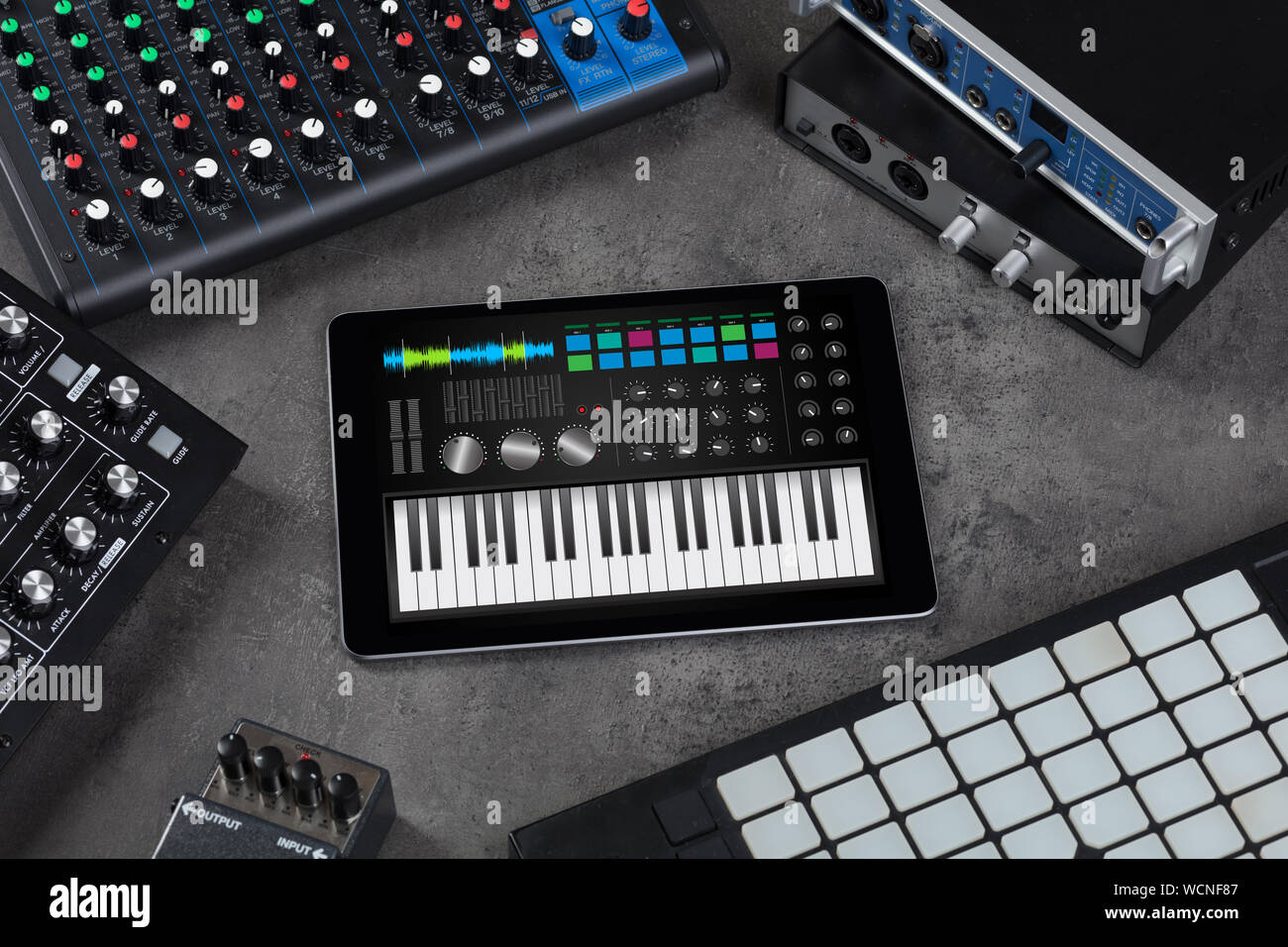 Piano synthesizer app on tablet and musical instrument concept Stock ...
