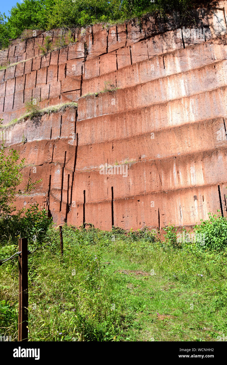 Rugged Red Volcanic Tuff Rock Wall at the Michelnau Stone Pit, a ...