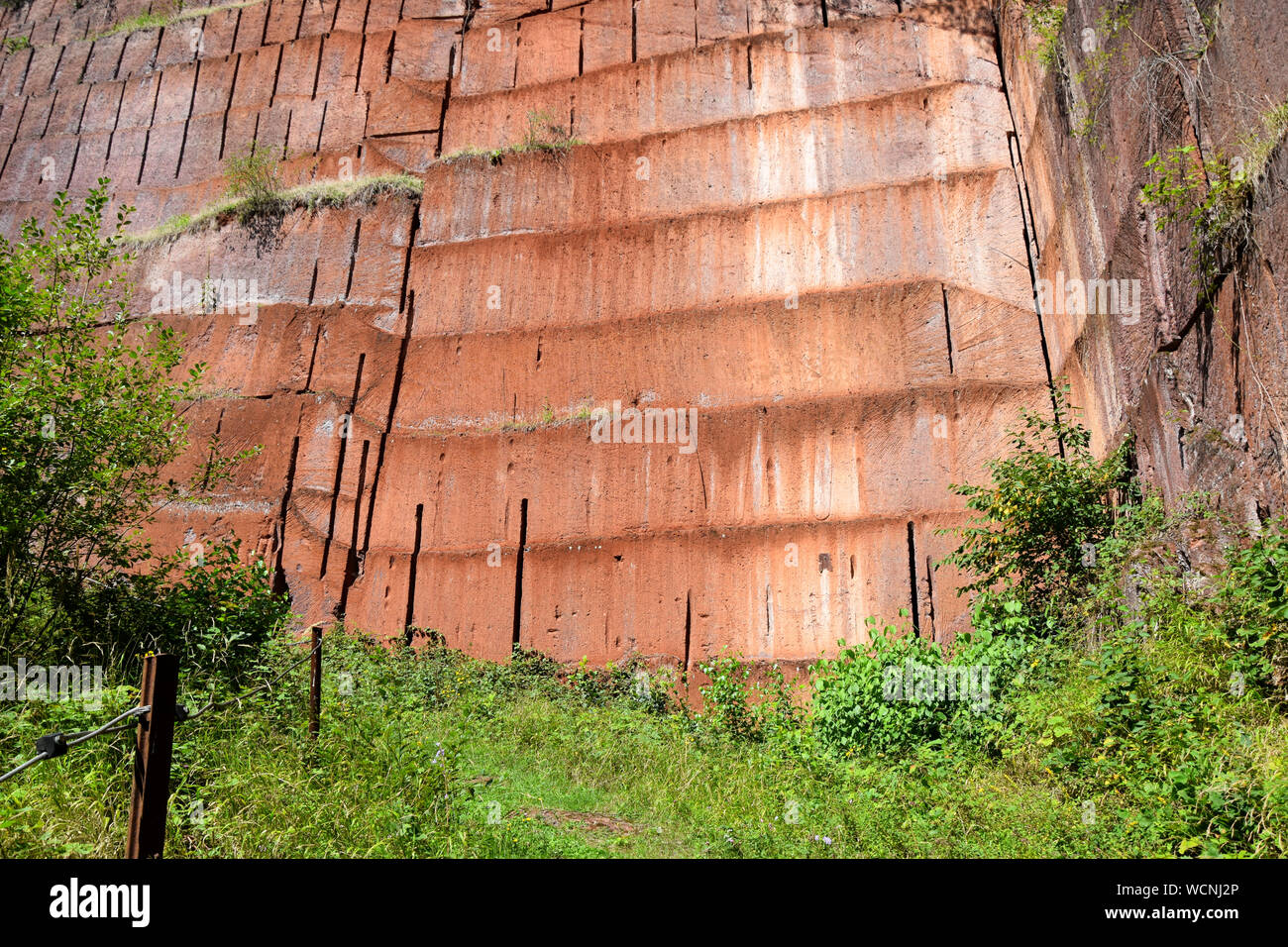 Rugged Red Volcanic Tuff Rock Wall at the Michelnau Stone Pit, a ...