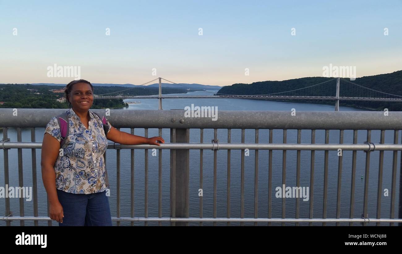 Woman Standing Bridge Over River Architecture High Resolution Stock ...