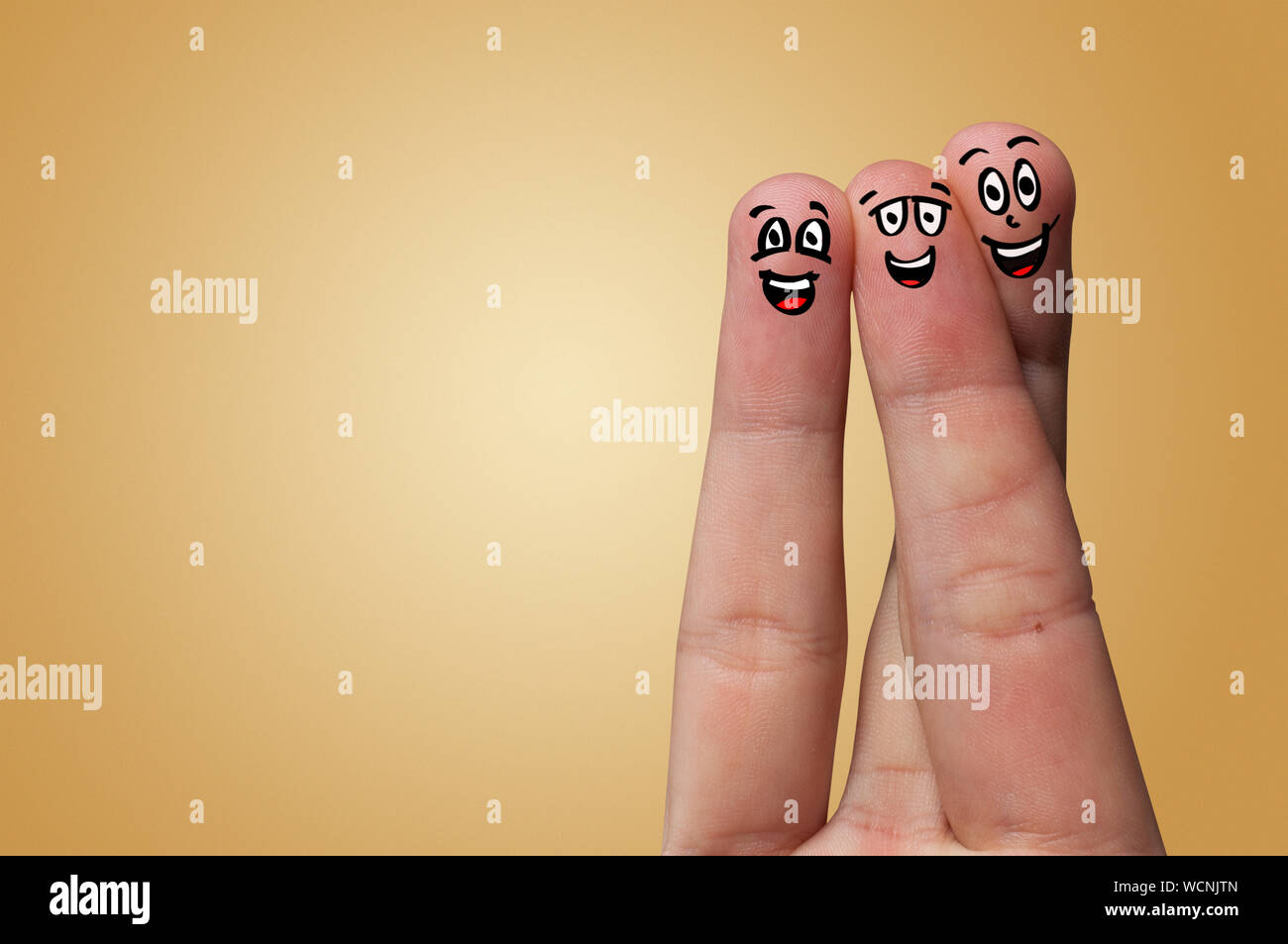 Smart looking fingers smiling and hugging Stock Photo - Alamy