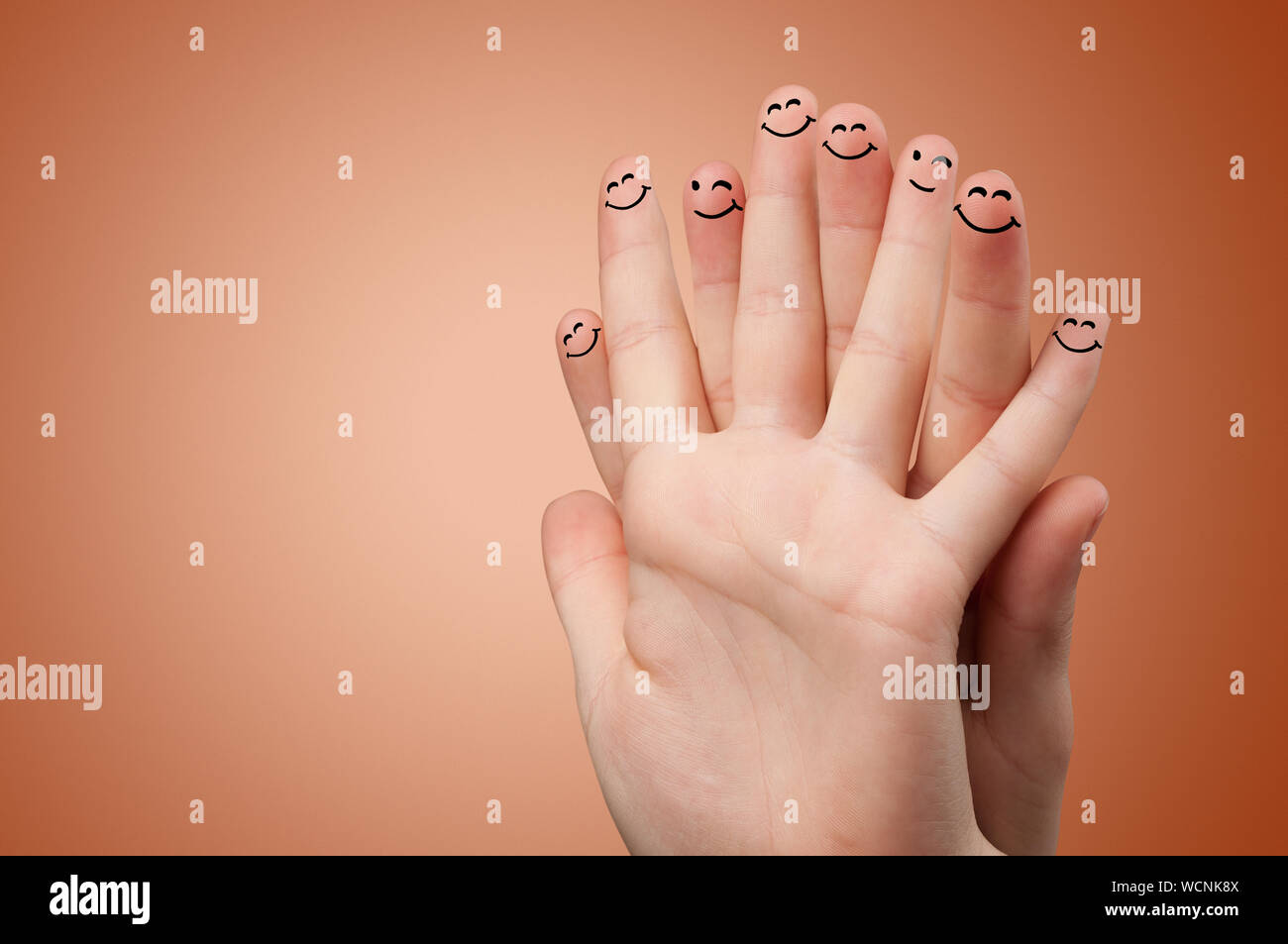 Happy face fingers hugs each other Stock Photo - Alamy