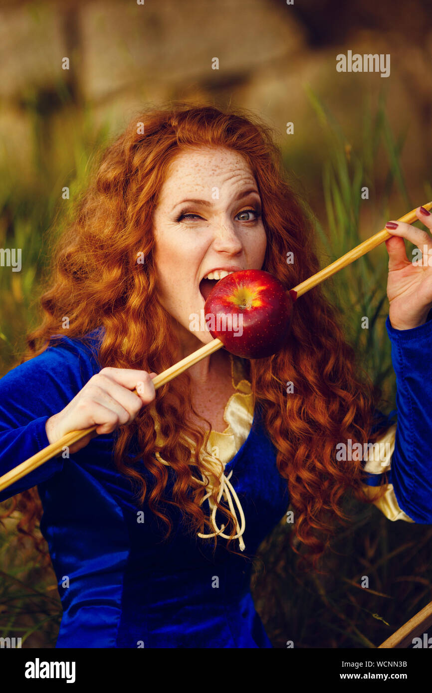 Brave. Merida from Brave film. Beautiful red-haired girl in the costume ...