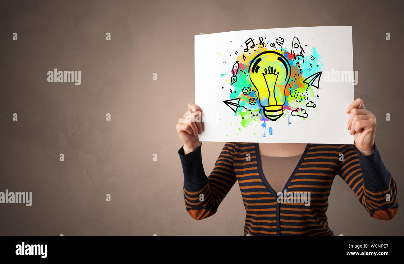 Person holding a paper with a drawn colorful idea concept Stock Photo ...