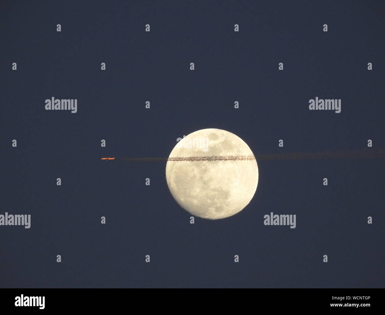 Airplane on the moon hi-res stock photography and images - Alamy
