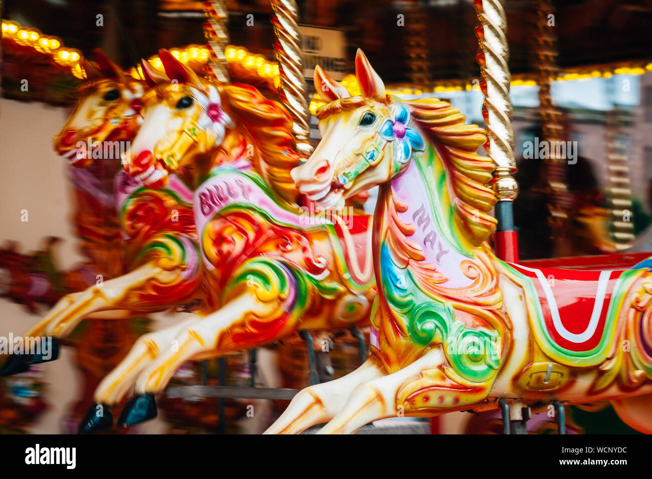 traditional fairground ride horse carousel. Merry go round Stock Photo ...