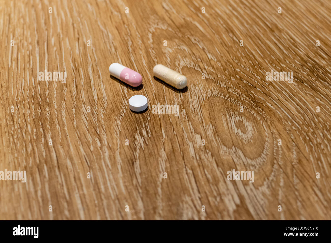 Pill on table hi-res stock photography and images - Alamy