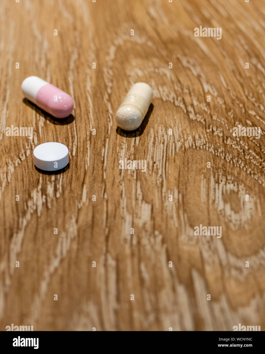 Pill on table hi-res stock photography and images - Alamy