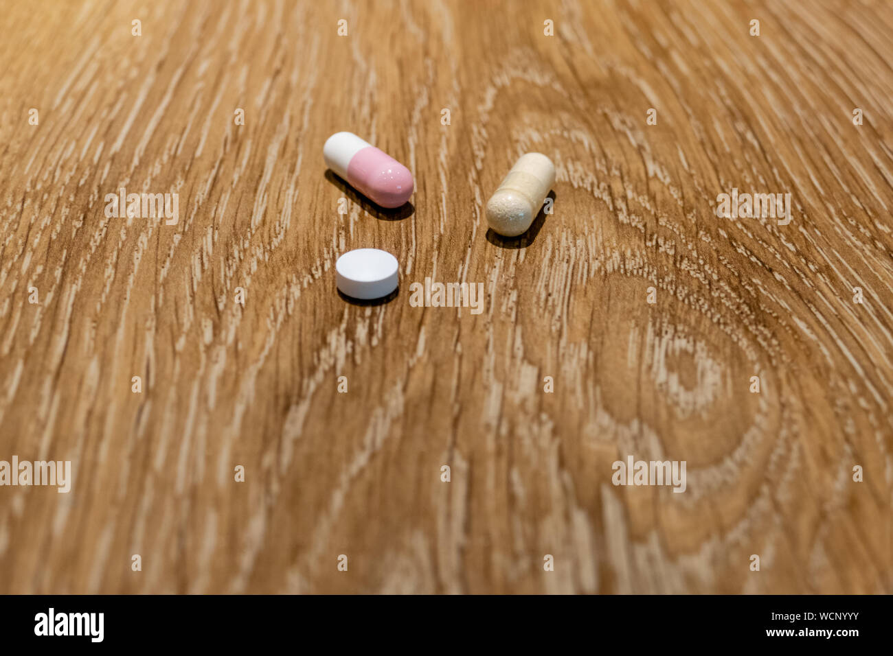 Pill on table hi-res stock photography and images - Alamy
