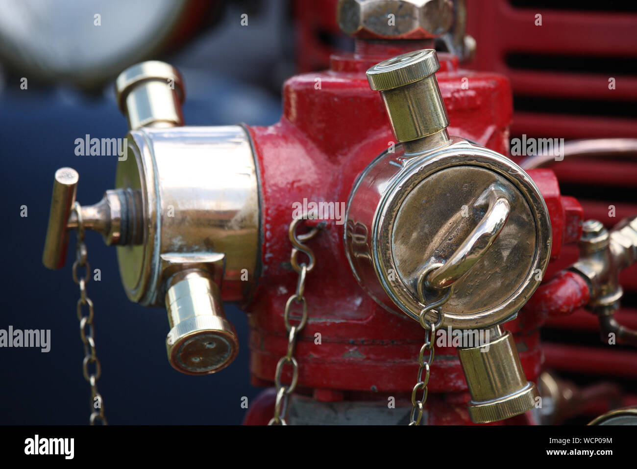 Old restored fire hydrant with brass parts Stock Photo - Alamy