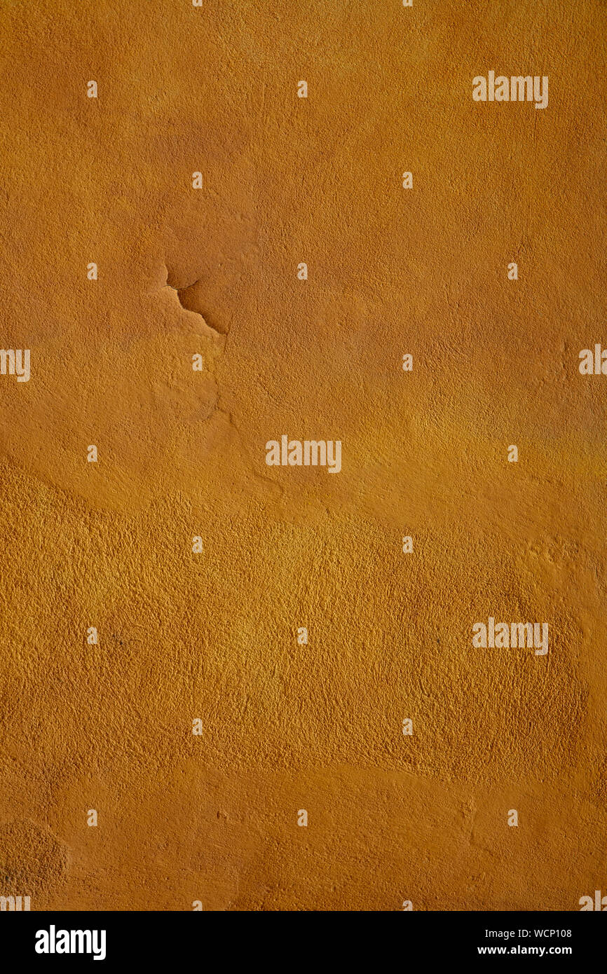 yellow ochre Textured Rendered Wall - Stucco / Fresco effect with small ...