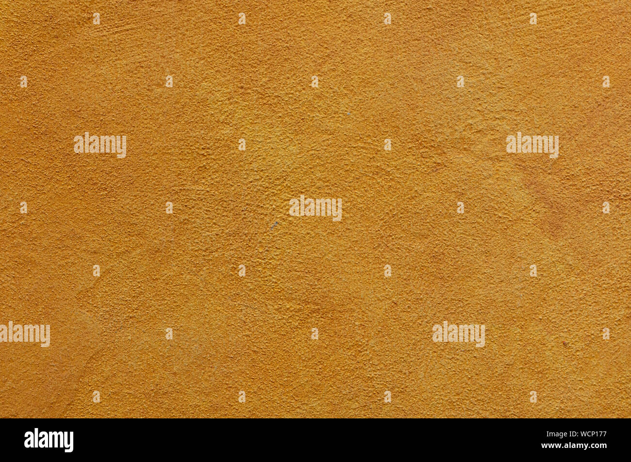 yellow ochre Textured Rendered Wall - Stucco / Fresco effect with small ...