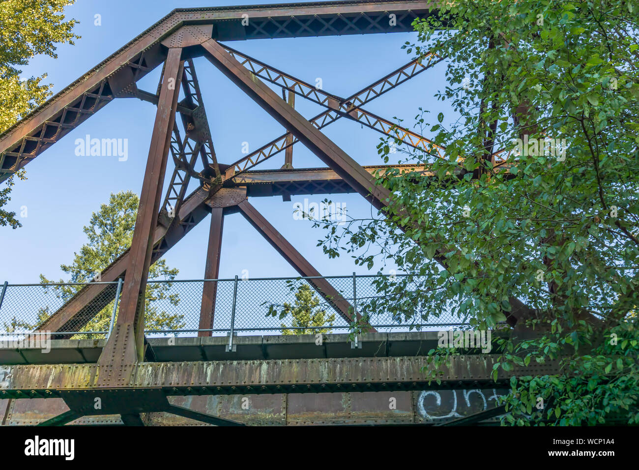 A view of a section of an old bridge above the Cedar River in Maple ...