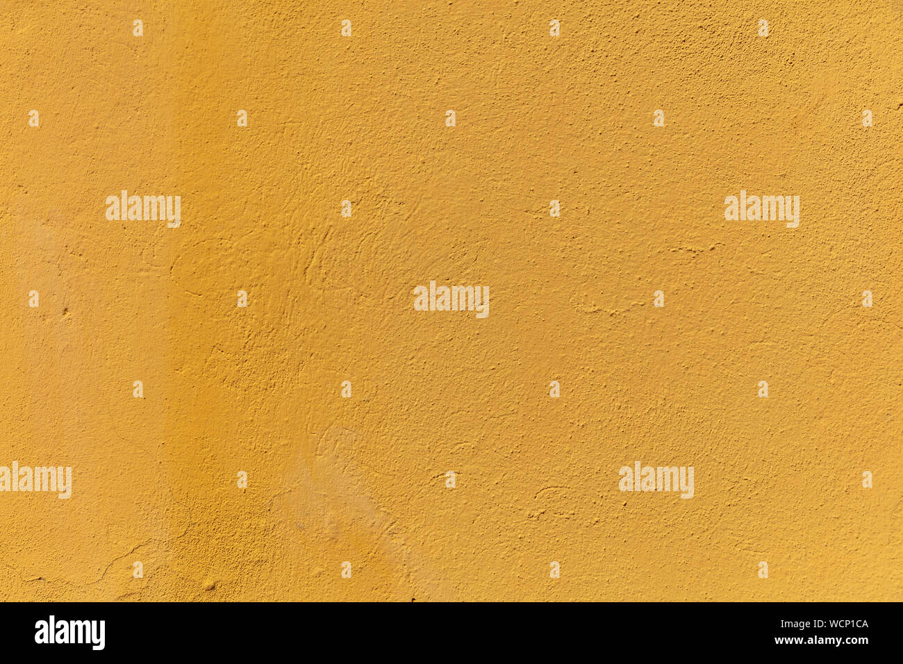 yellow Textured Rendered Wall - Stucco / Fresco effect with small ...