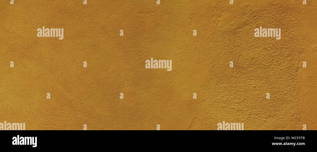 Yellow Ochre Textured Rendered Wall - Stucco / Fresco effect with small ...