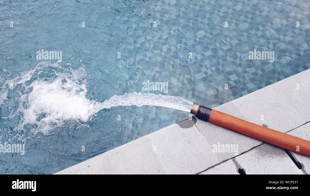 Falling into swimming pool hi-res stock photography and images - Alamy